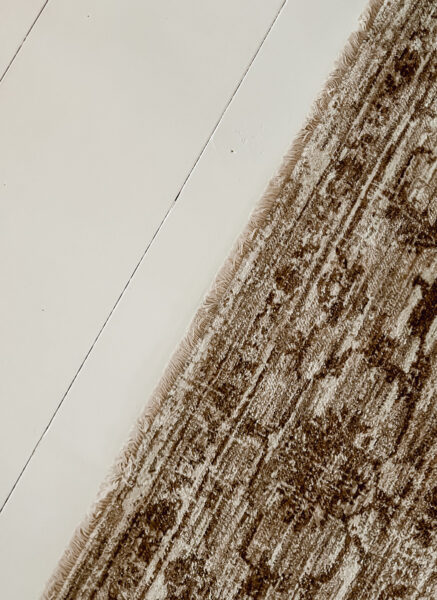 New Warm-Toned Rug for our Family Room - Deb and Danelle