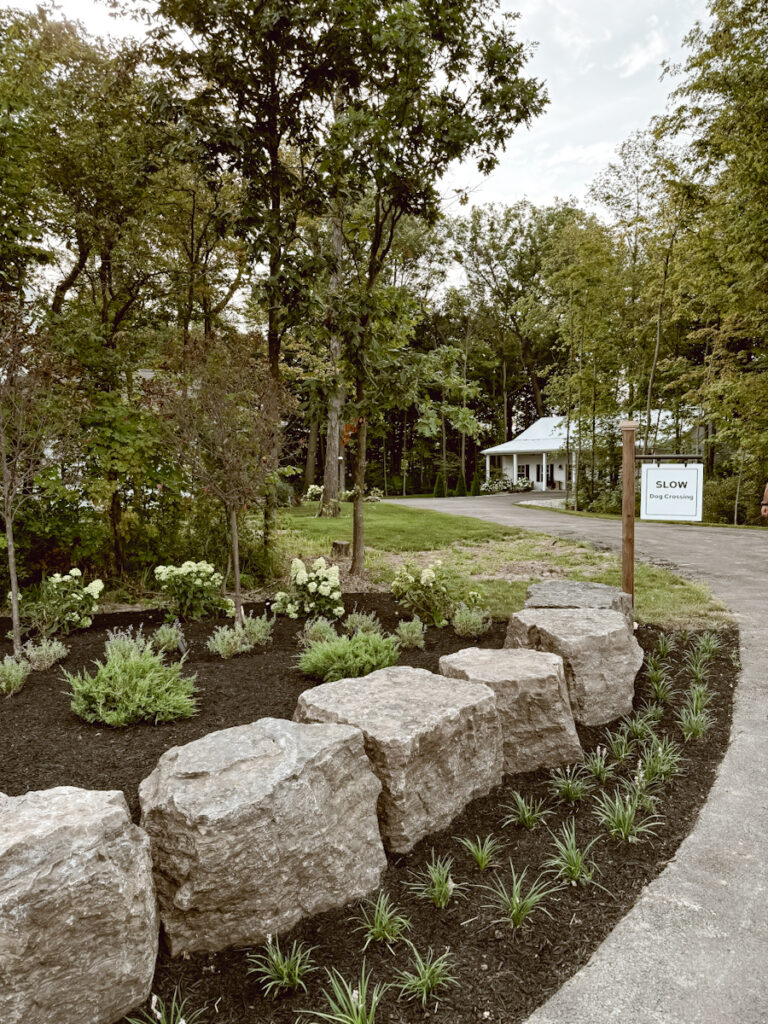 Landscaping Around our Driveway and New Sign - Deb and Danelle